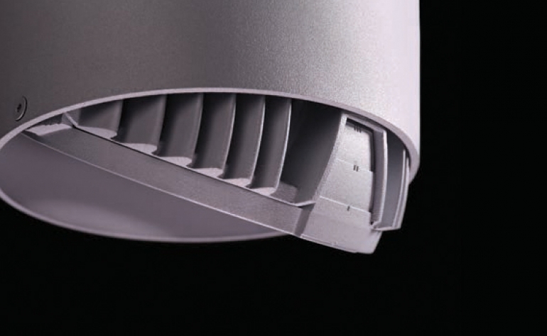 SY810. SYRIOS 8” SURFACE CEILING DOWN LIGHT. by Luminis, Acuity Brands